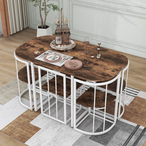 Round table with hidden chairs store